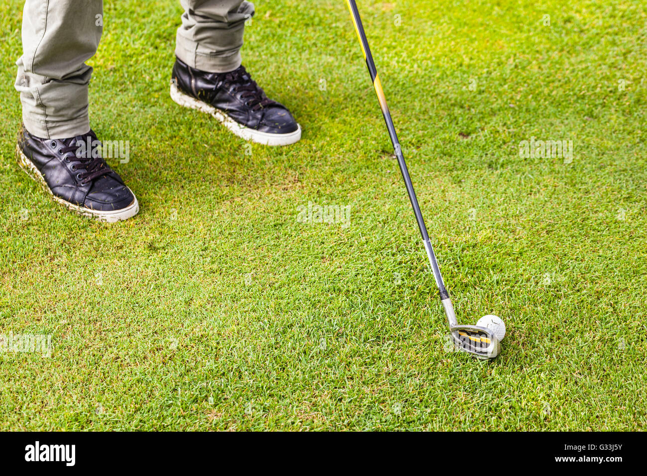 detail of a driver club and a golf ball on a golf course Stock Photo ...