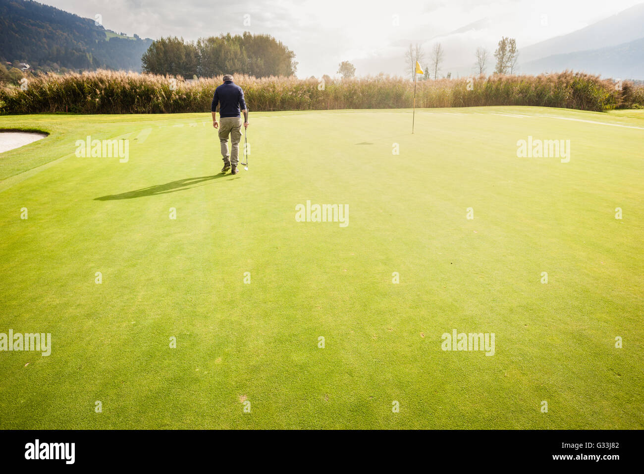 a beautiful golf course in a sunny summer day Stock Photo - Alamy