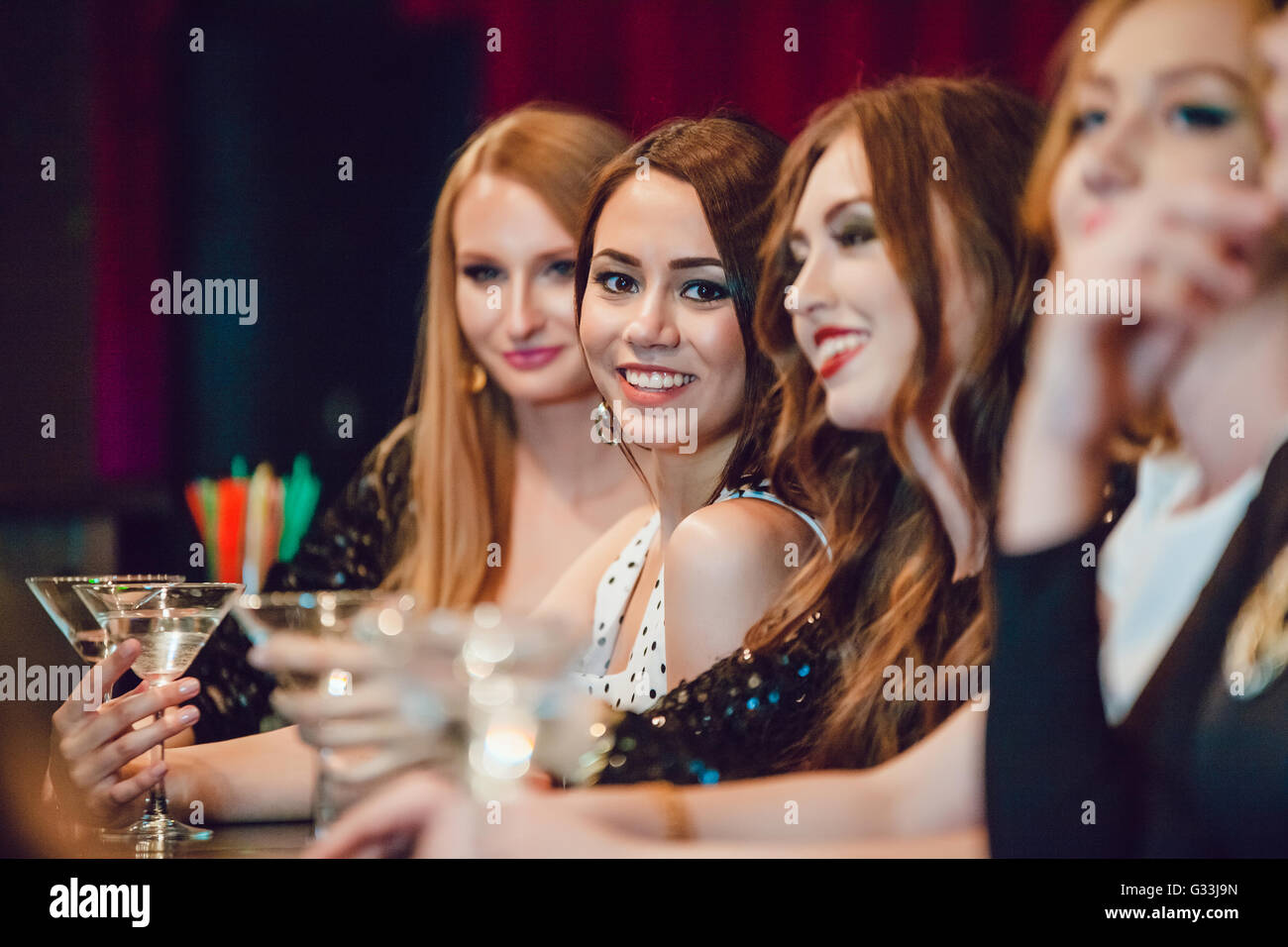 Beautiful girls having fun at a party in nightclub Stock Photo - Alamy