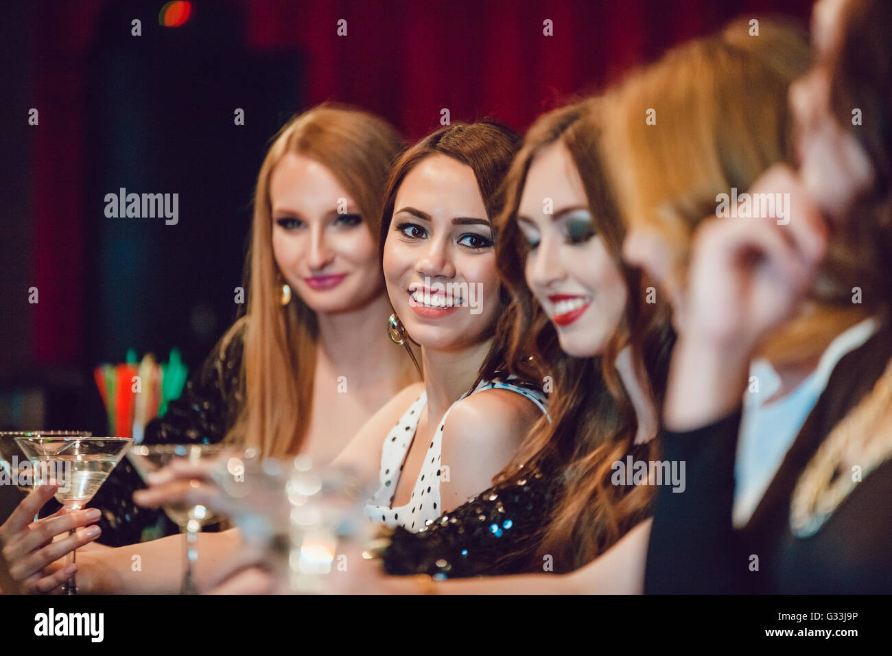 Beautiful girls having fun at a party in nightclub Stock Photo - Alamy