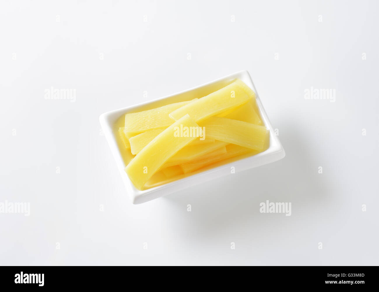 bowl of bamboo shoot slices on white background Stock Photo - Alamy
