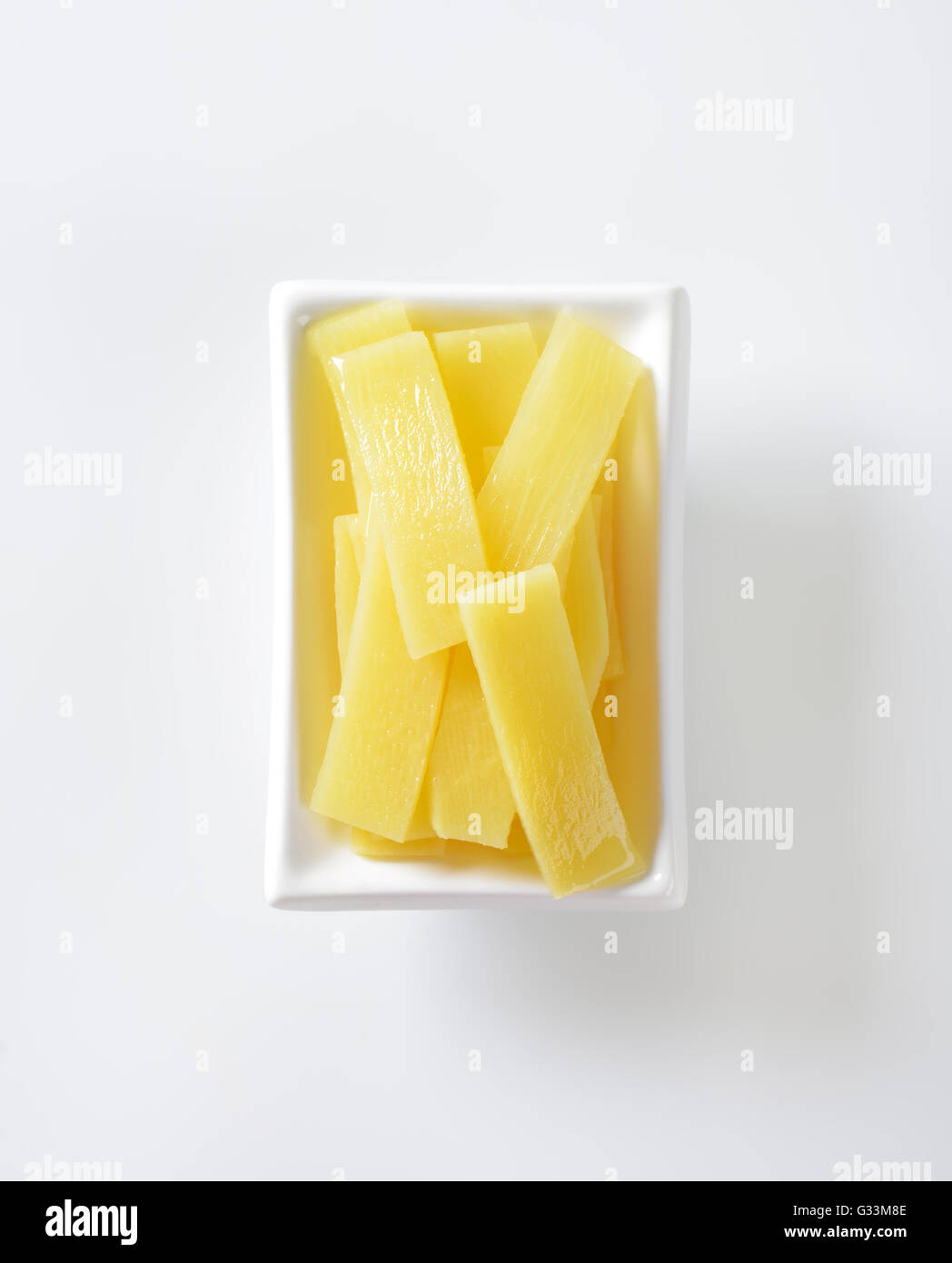 bowl of bamboo shoot slices on white background Stock Photo - Alamy