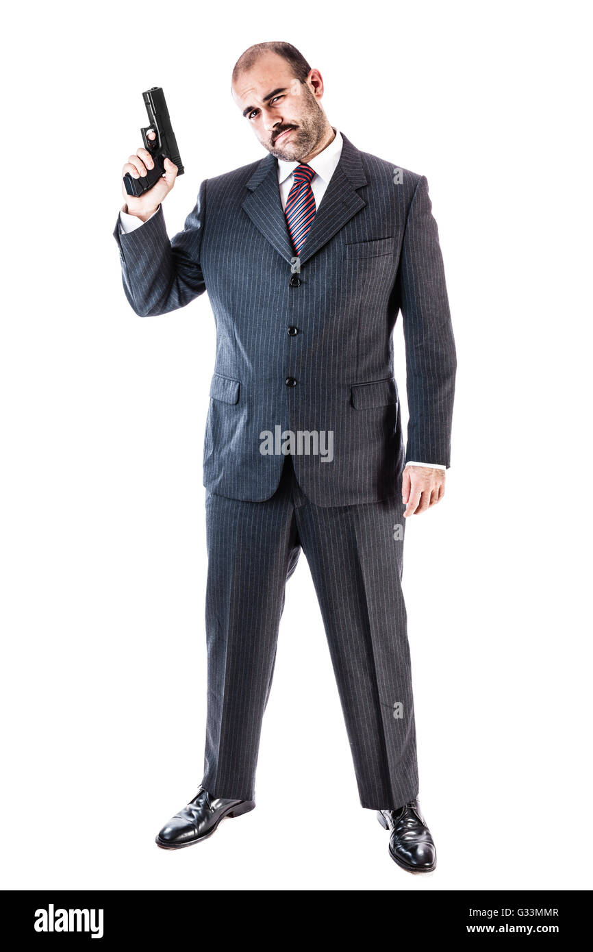 portrait of a classy businessman or mobster or security guard holding a ...