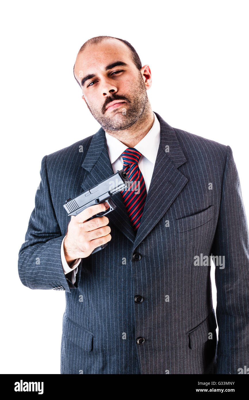 portrait of a classy businessman or mobster or security guard holding a ...