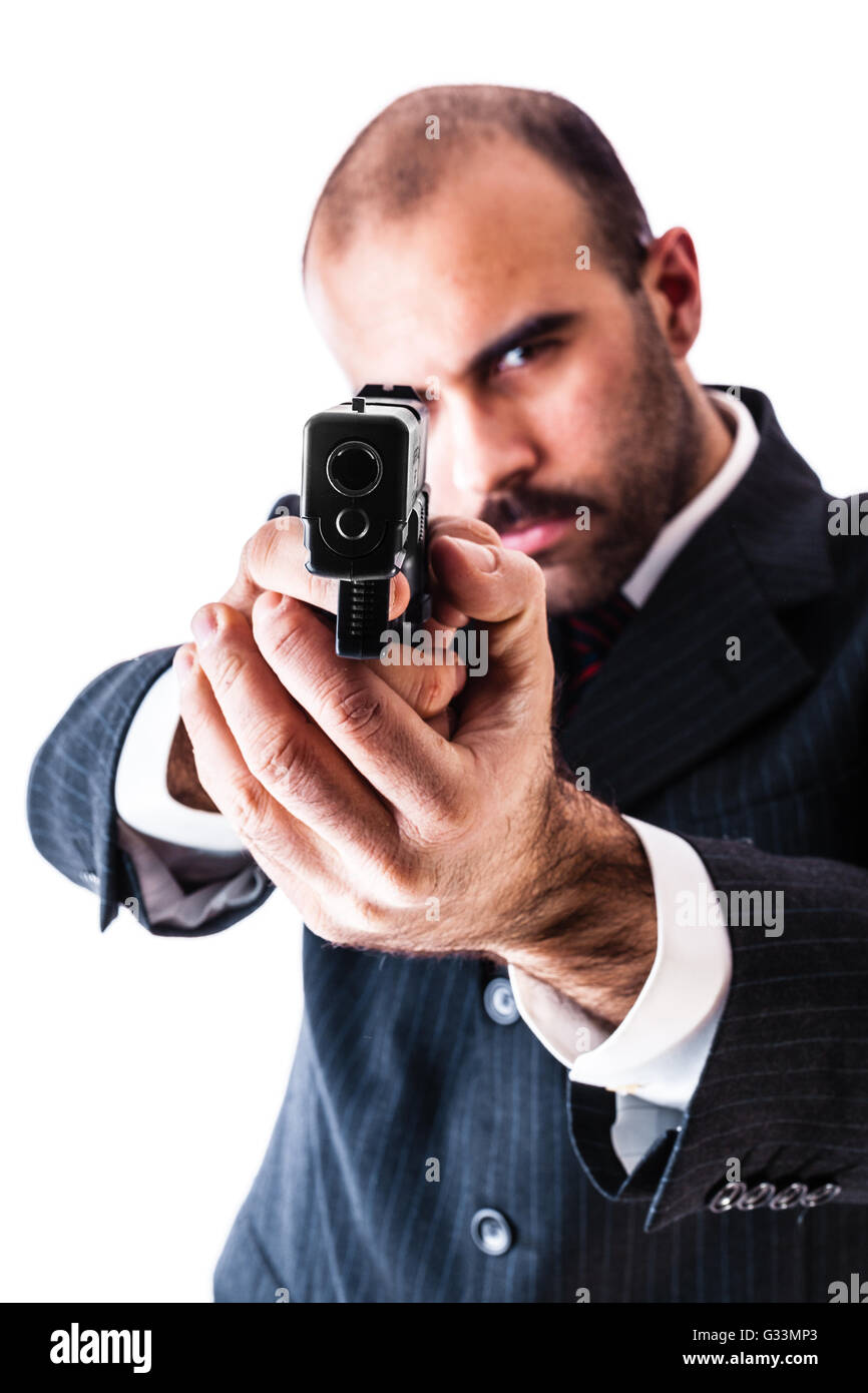 portrait of a classy businessman or mobster or security guard holding a ...