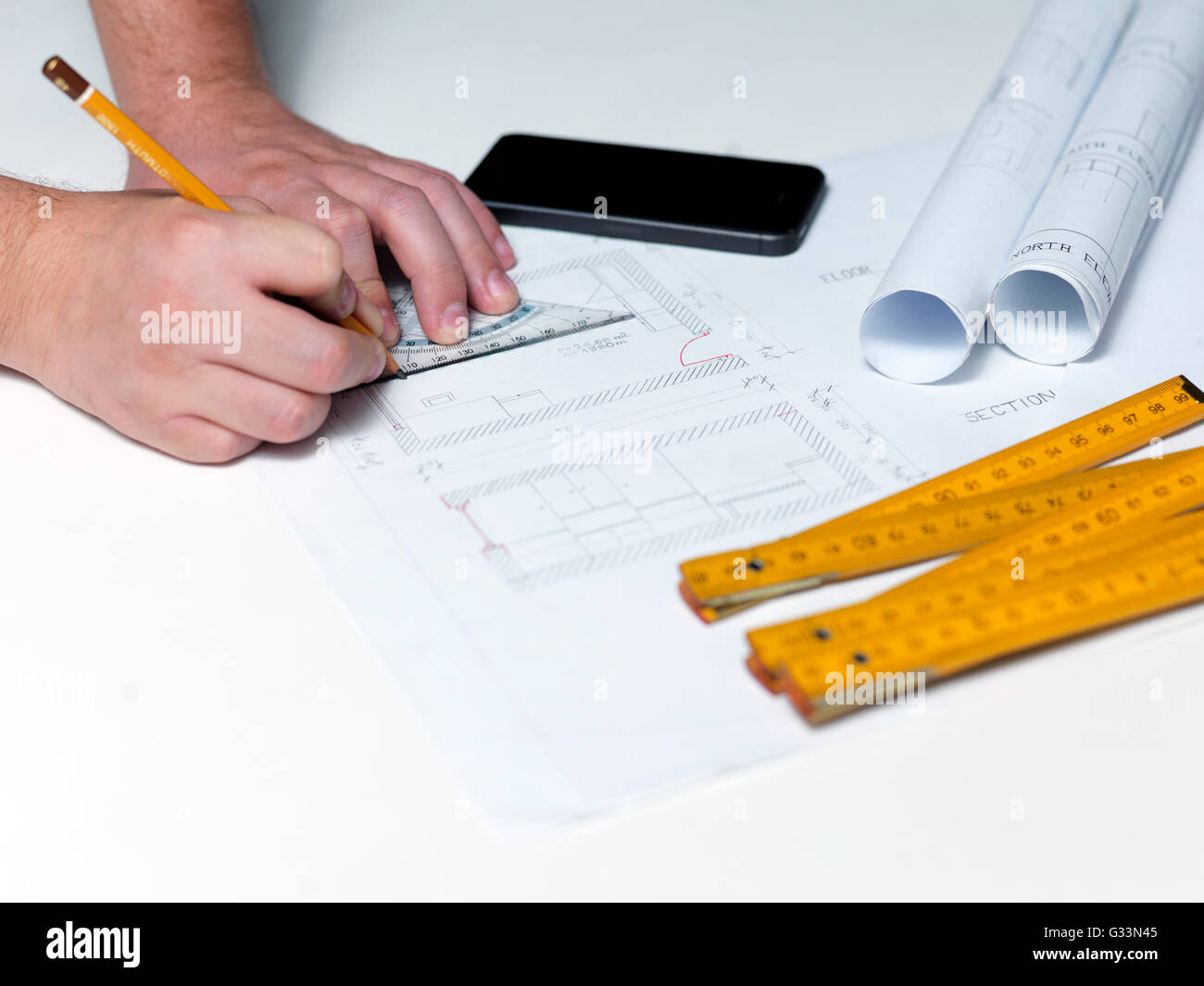 Business man draw buildings and present his architectural project Stock ...