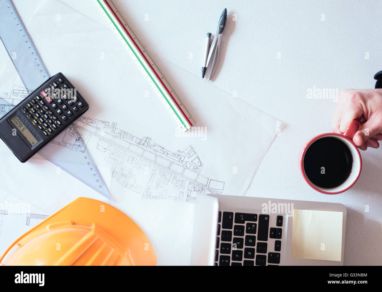 Top view of architect drawing on architectural project Stock Photo - Alamy