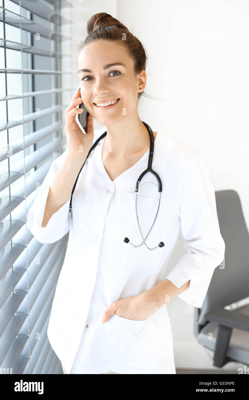Female physician phone call hi-res stock photography and images - Alamy