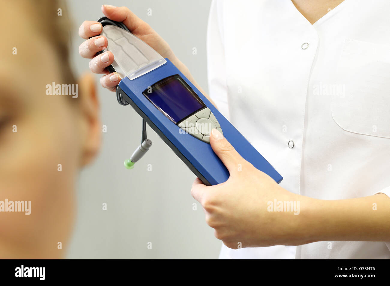 Hearing test doctor patient hi-res stock photography and images - Alamy