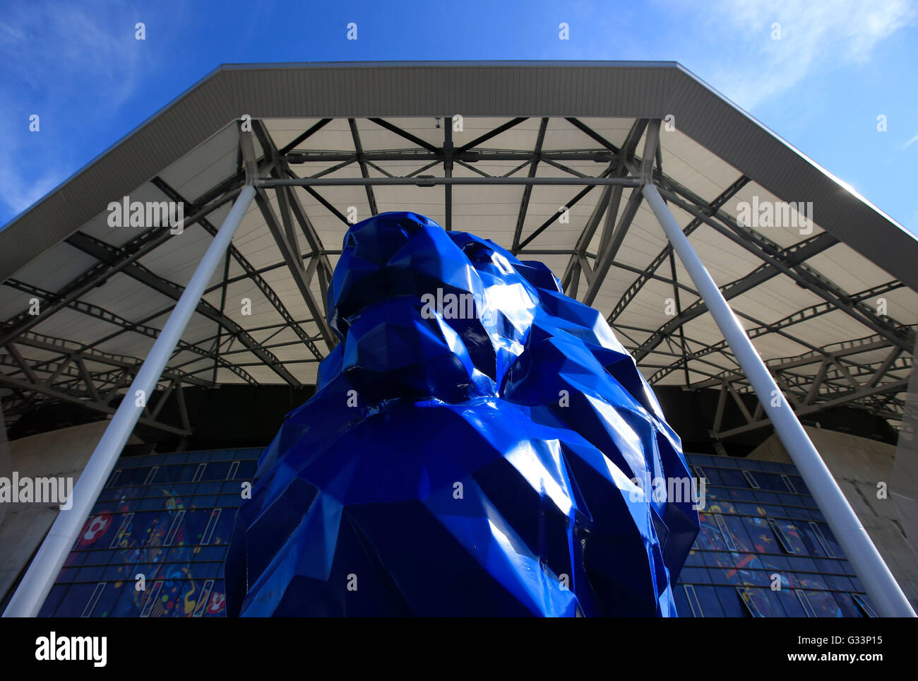 A statue of a lion stands outside Parc Olympique Lyonnais, France Stock ...