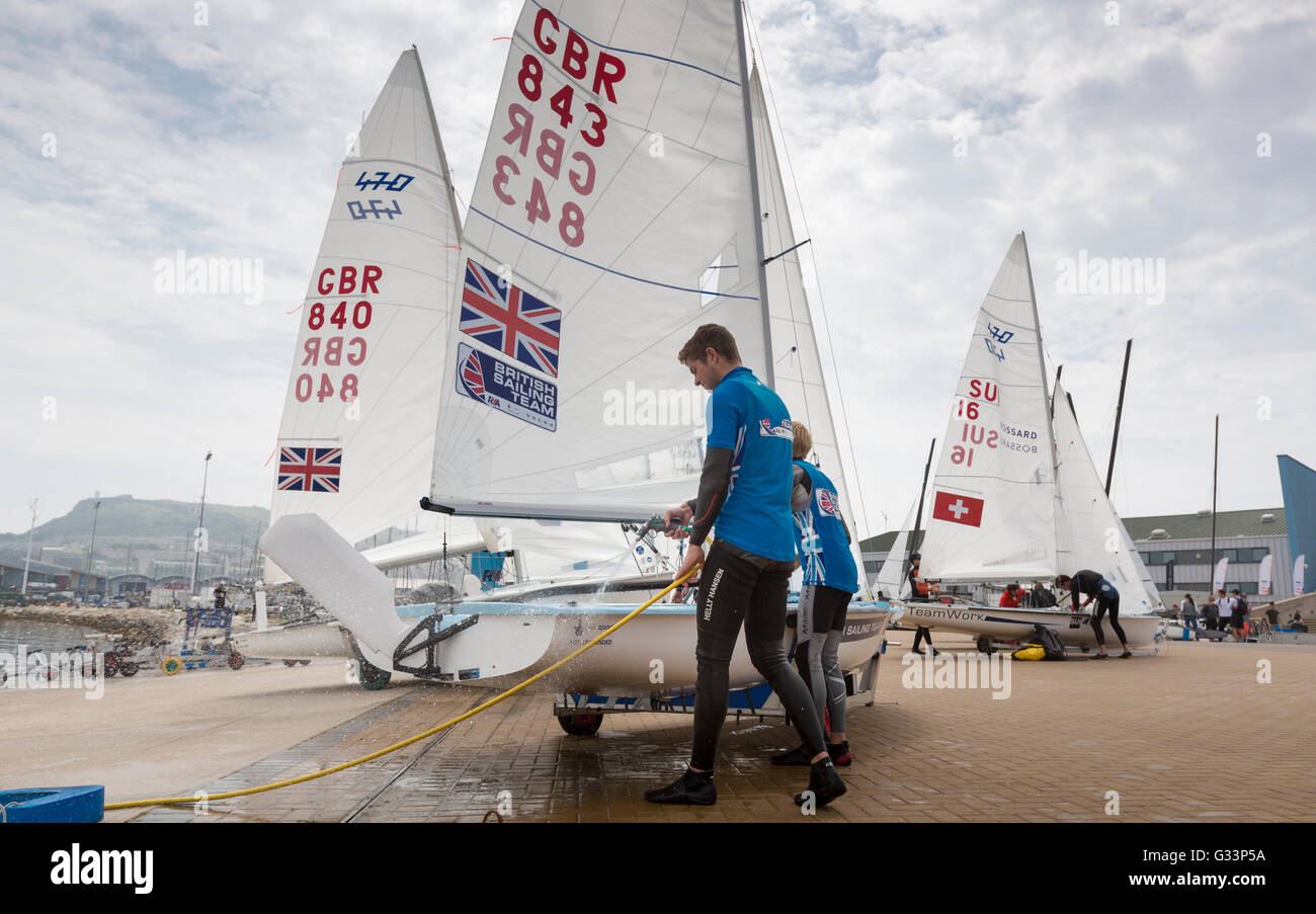 British sailing squad members spray down hi-res stock photography and ...