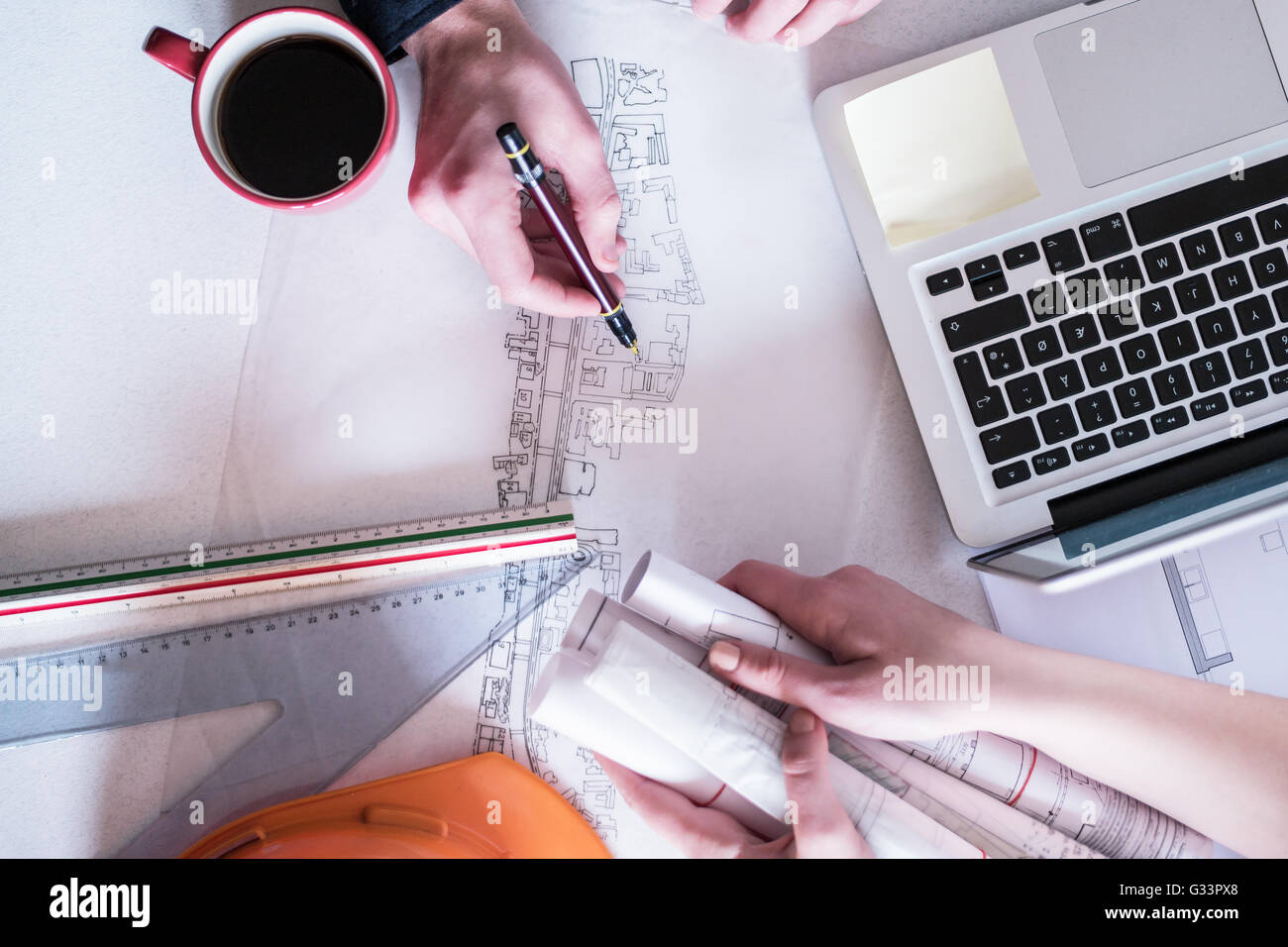 Top view of architect drawing on architectural project Stock Photo - Alamy