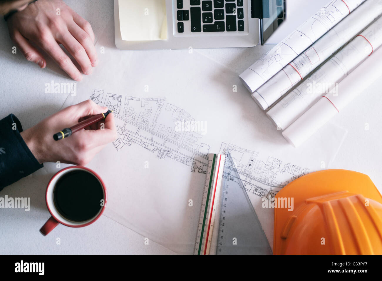 Top view of architect drawing on architectural project Stock Photo - Alamy