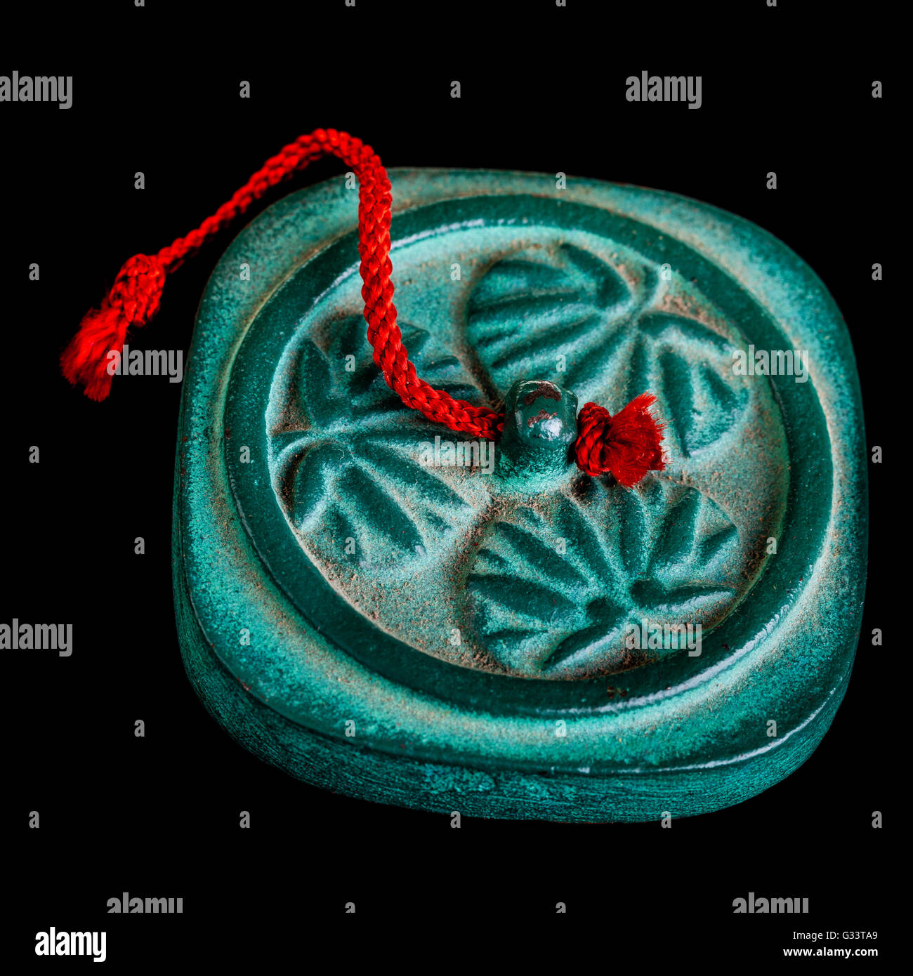 a chinese paperweight souvenir isolated over a black background Stock ...