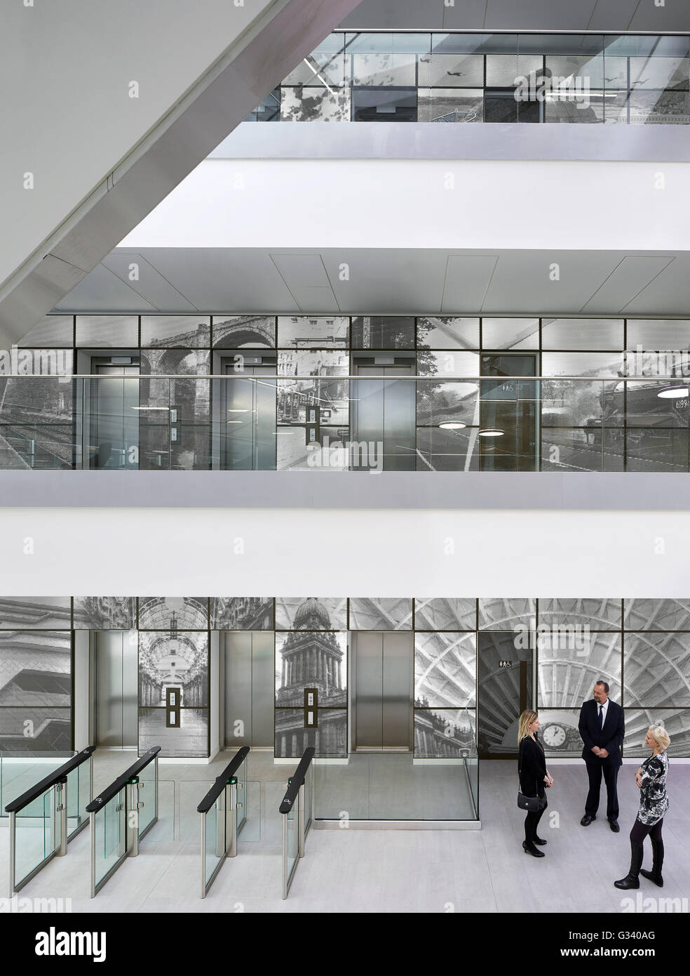 Ground floor reception and galleries with photo murals. KPMG Offices ...