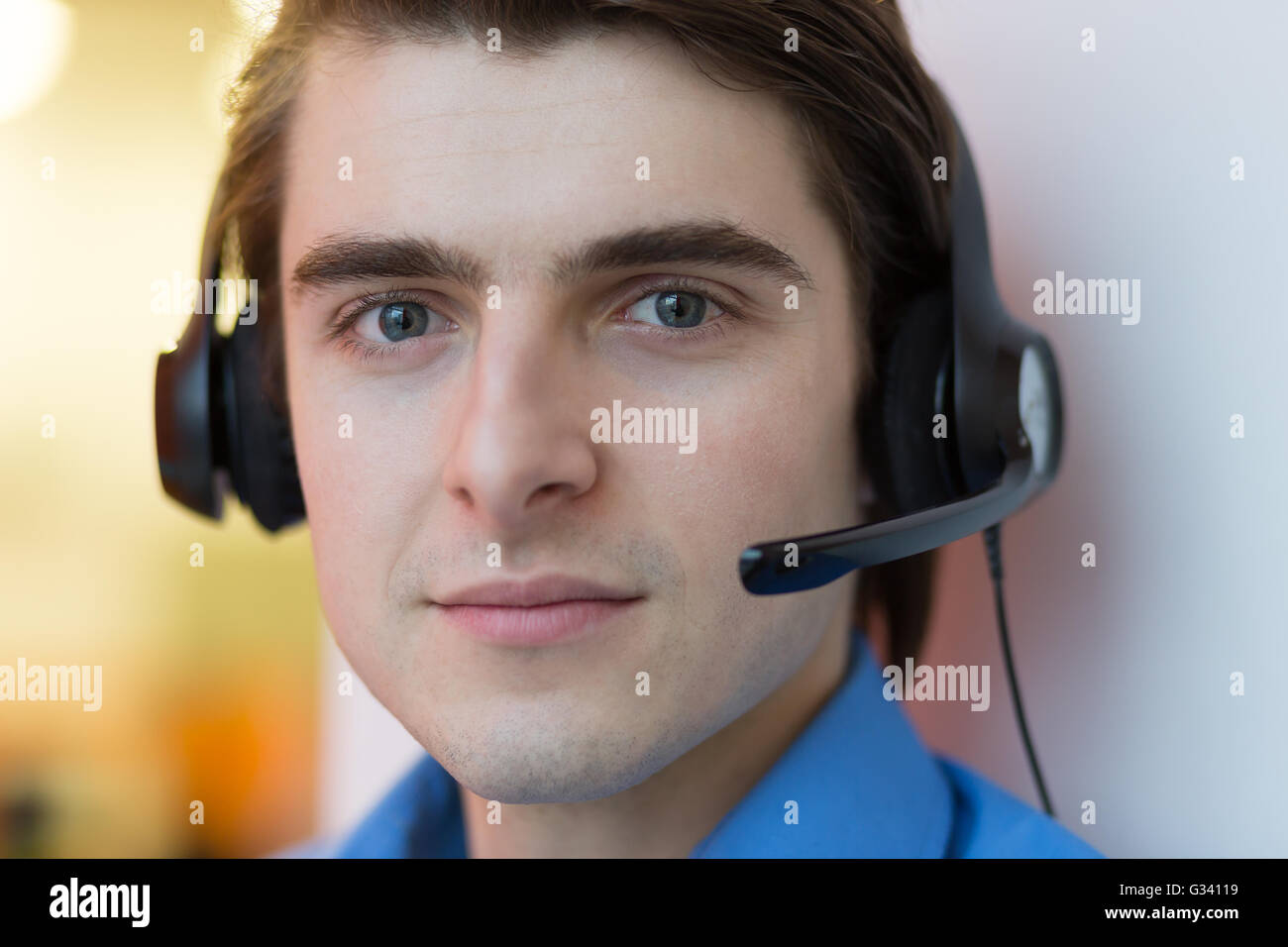 Young call center agent speaking with costumer Stock Photo - Alamy