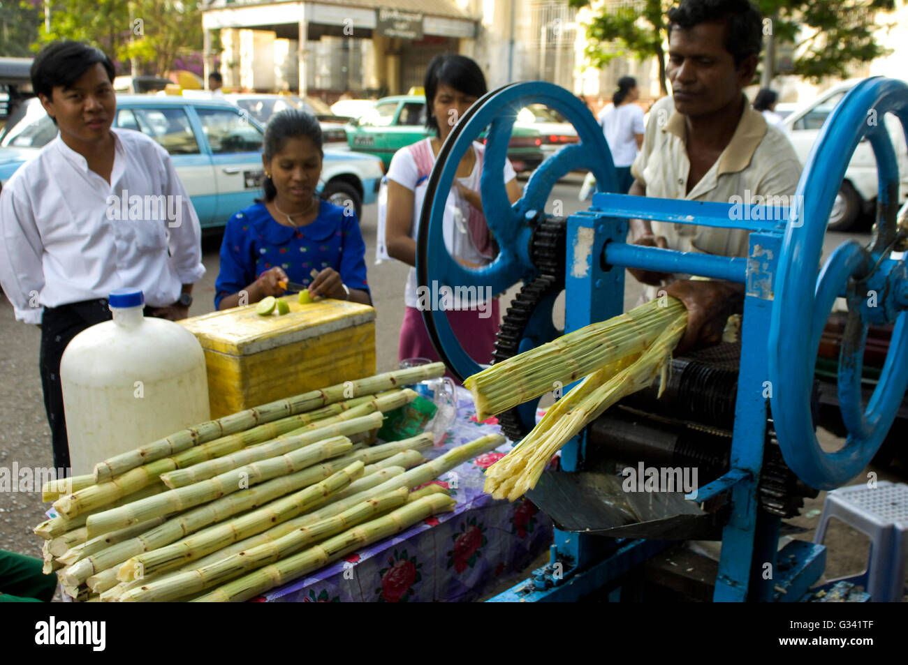 Man sugar cane street scene in yangon hi-res stock photography and ...