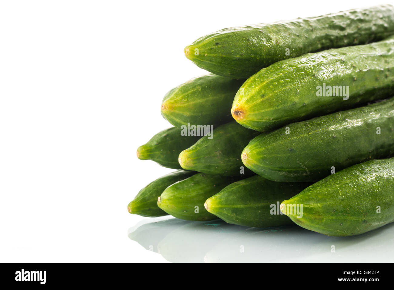 Fresh cucumber vegetable close up on white background Stock Photo - Alamy