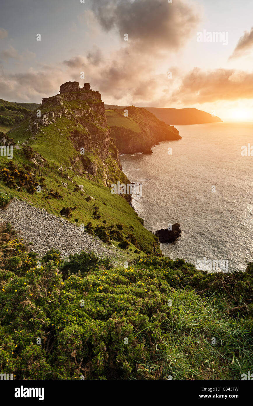 Beautiful sunset landscape image of Valley of The Rocks in Devon ...