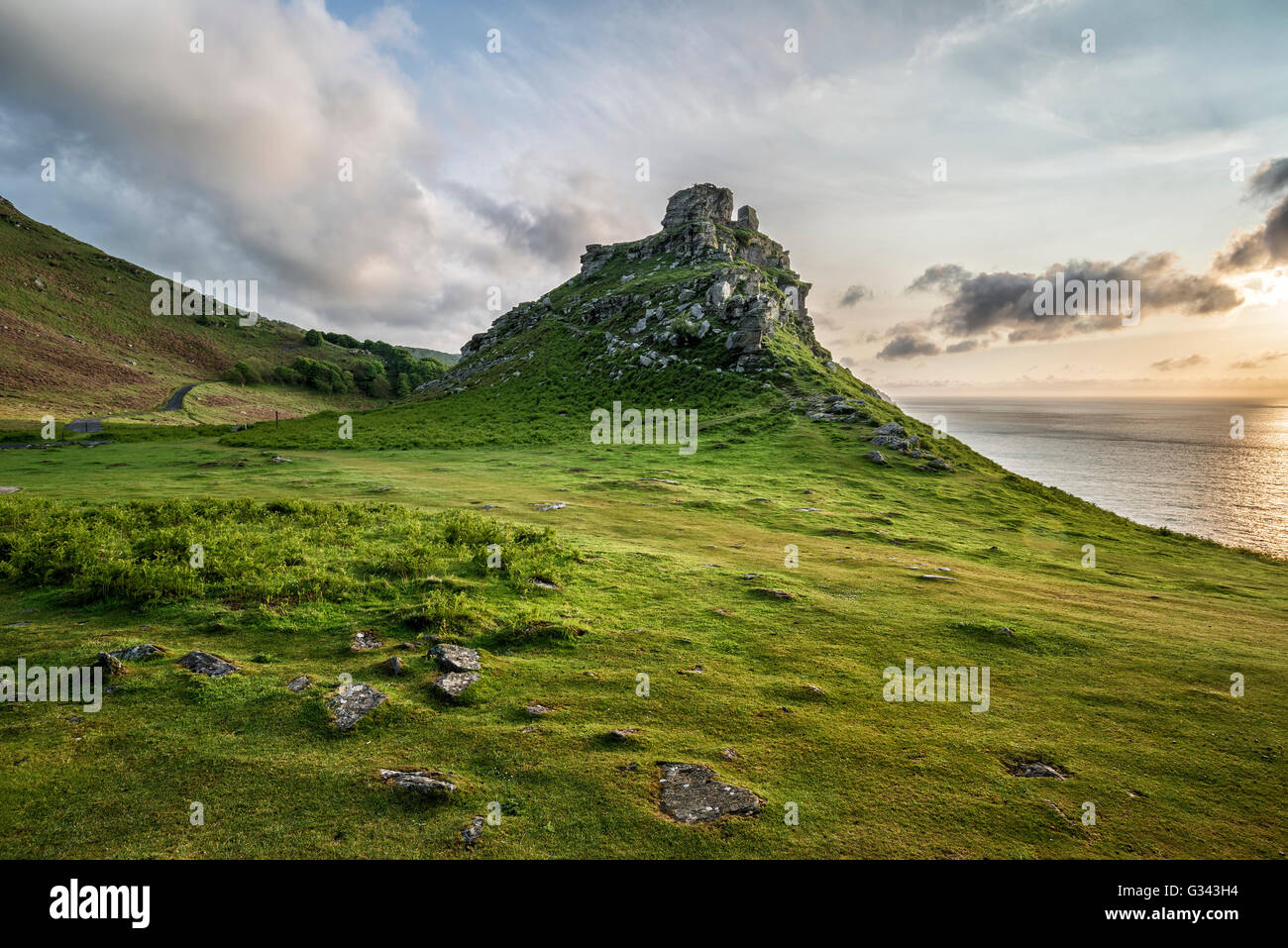 Beautiful sunset landscape image of Valley of The Rocks in Devon ...