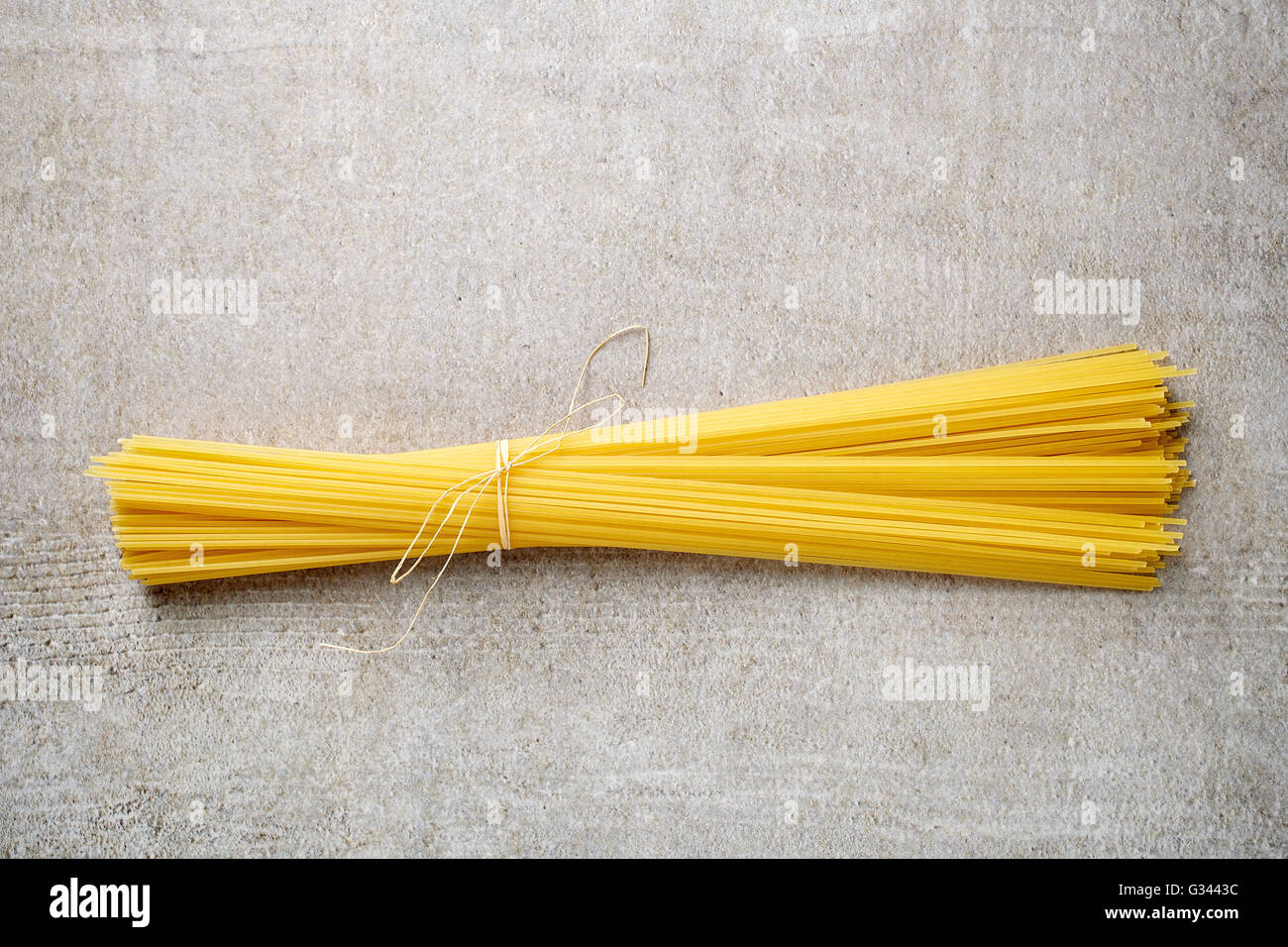 Spaghetti pasta on stone table, top view Stock Photo - Alamy