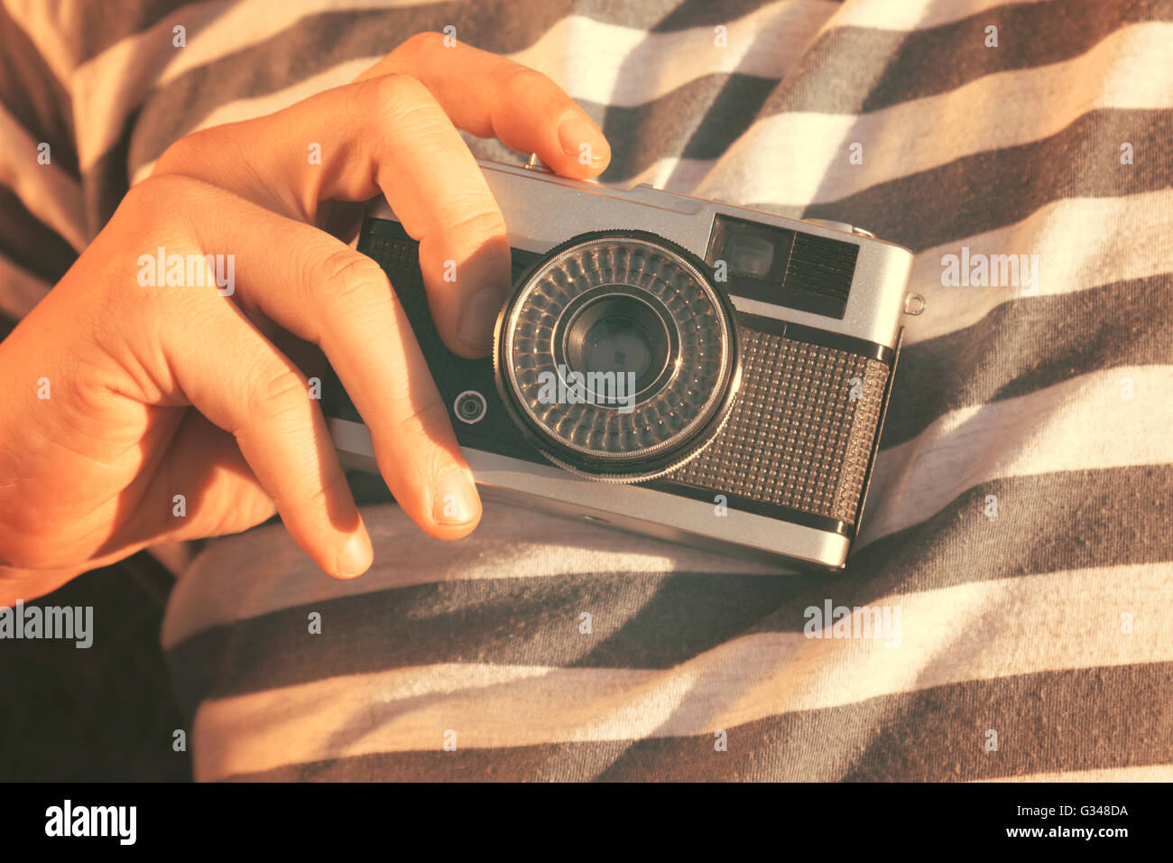 Hand holding vintage camera close hi-res stock photography and images ...