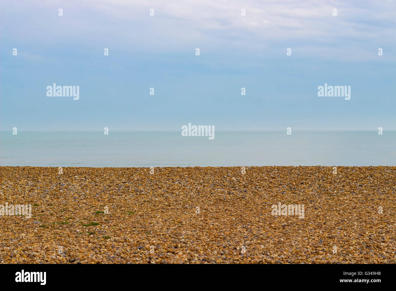 A view of the sea horizon line from the pebble beach of Hastings in ...