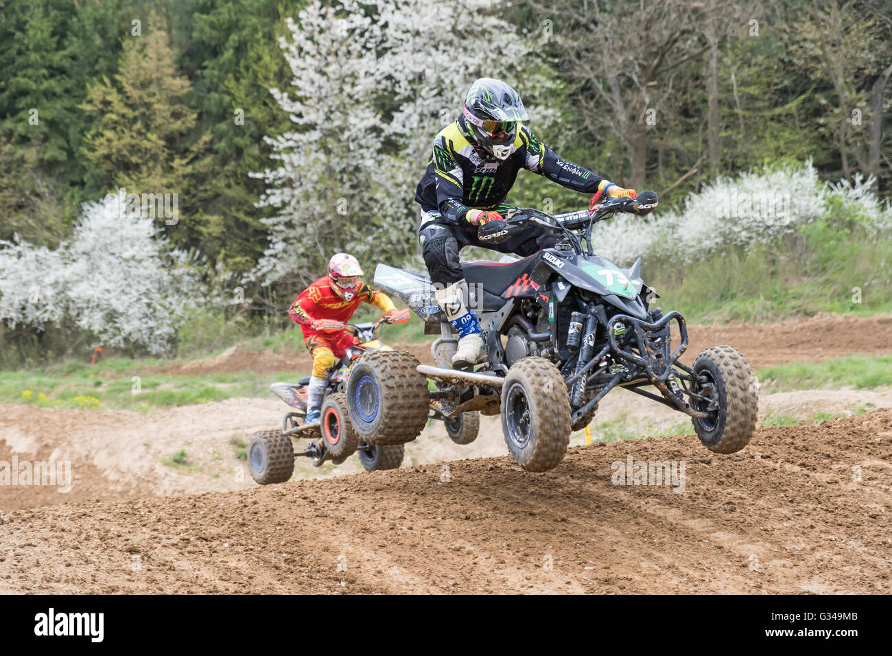 Two quad riders are jumping in the race Stock Photo - Alamy