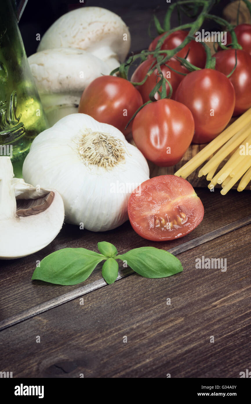 Vintage view of the ingredients of Italian cuisine are lying on a ...