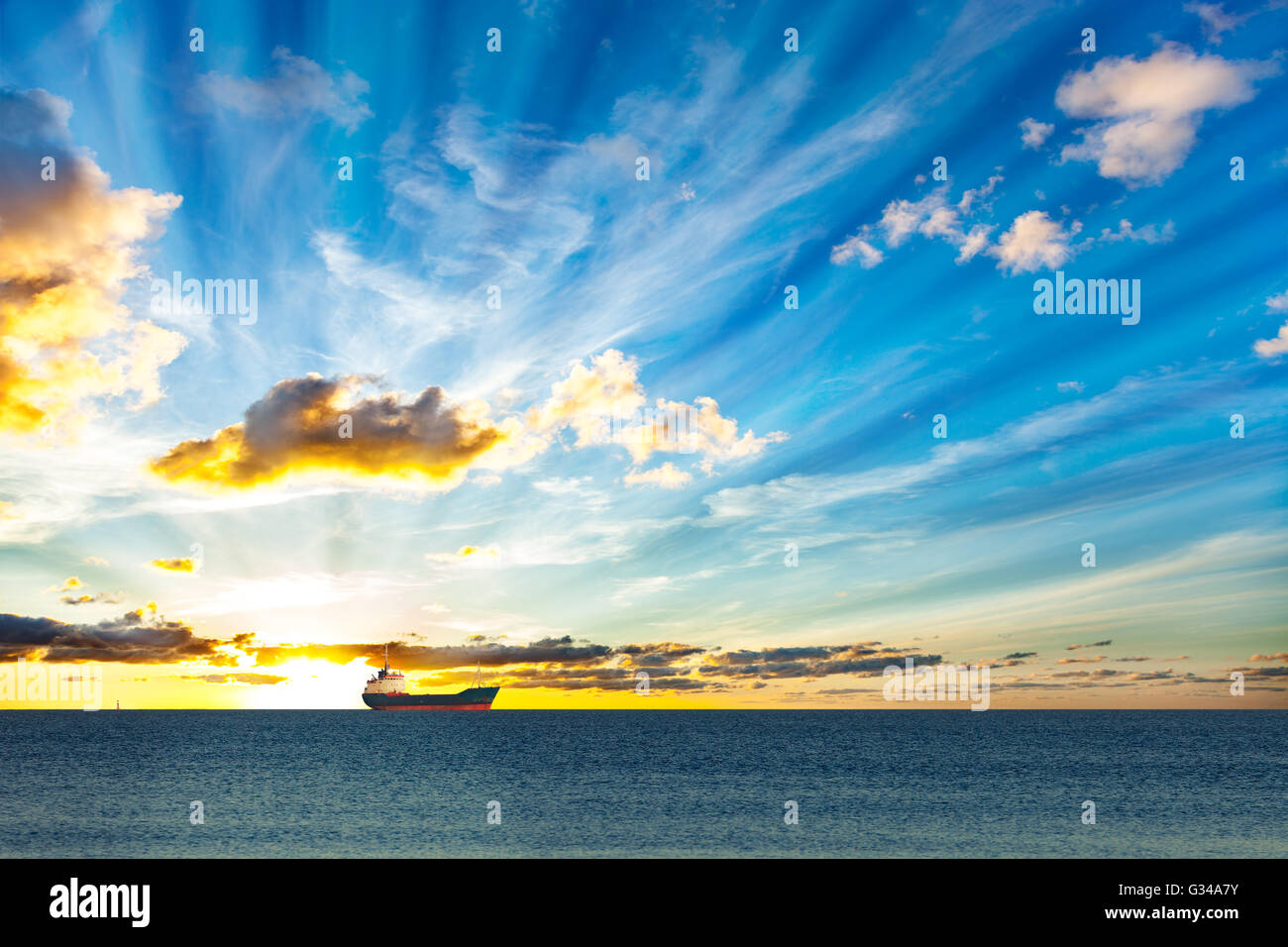 Shipping vessel sunset hi-res stock photography and images - Alamy