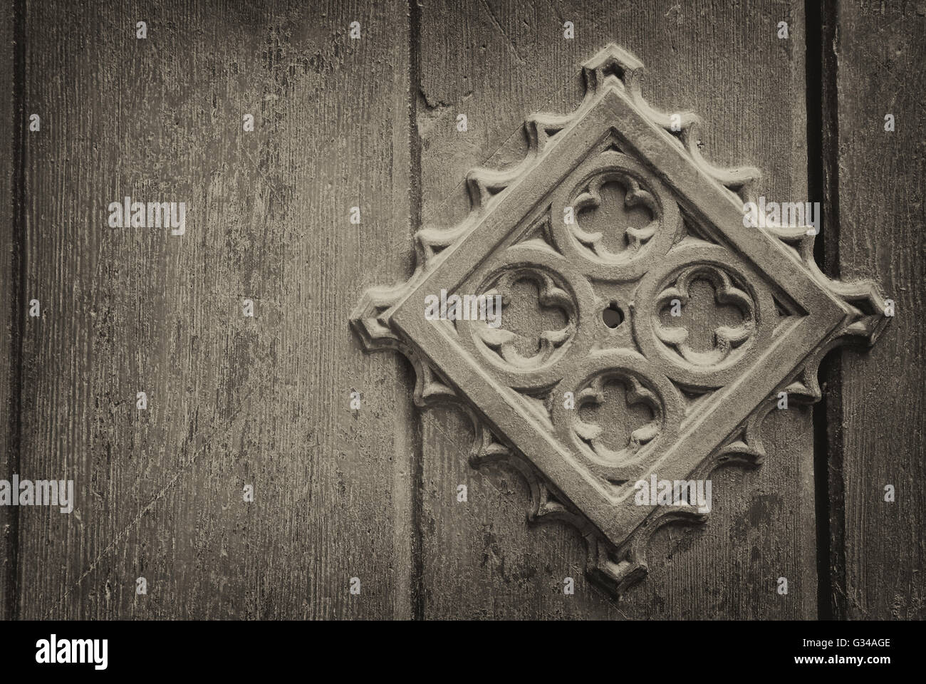 Old metal medieval door background. With a key lock on the leright side ...