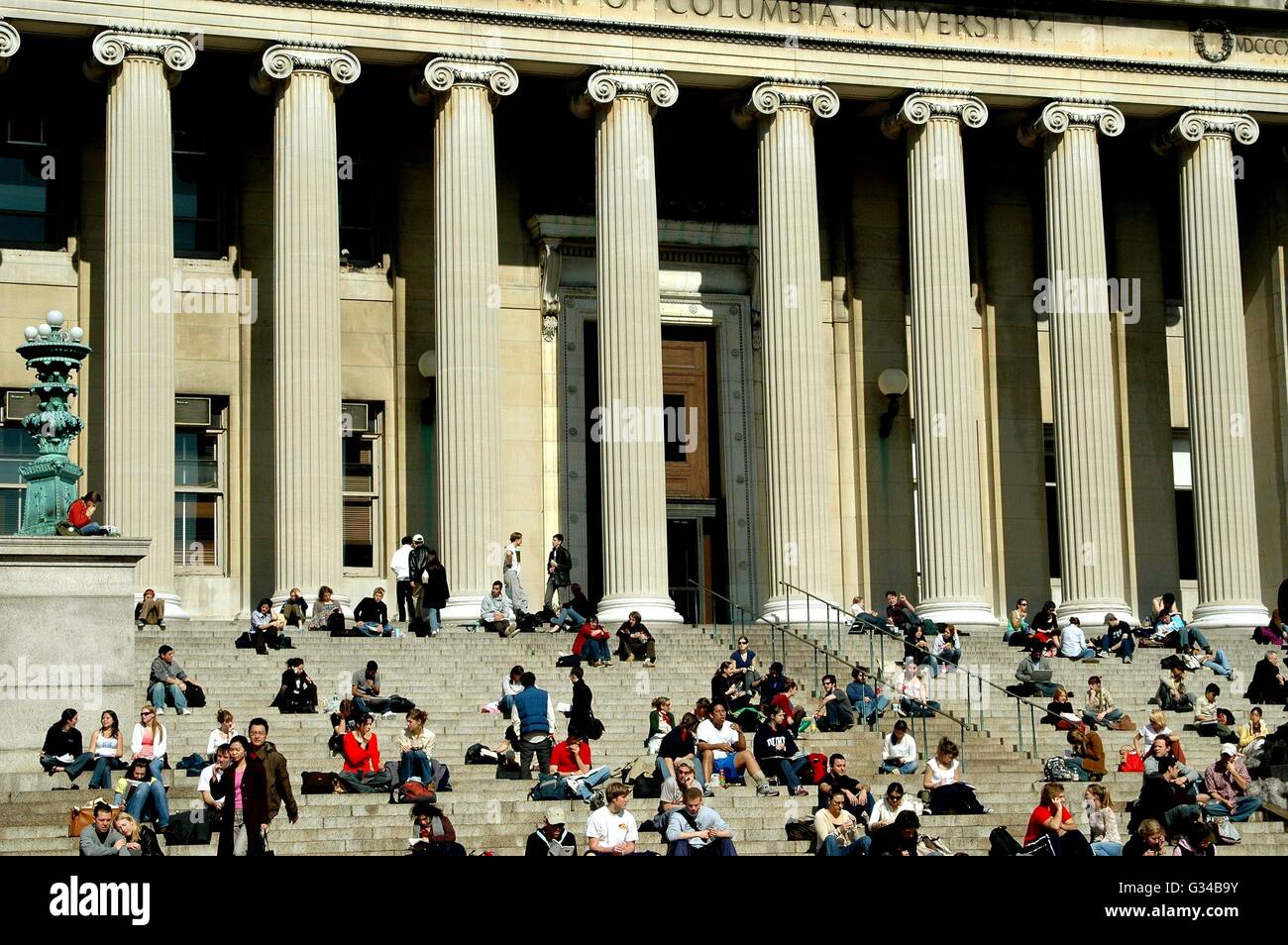 New York City: Students sitting on the steps of the Library of Columbia ...