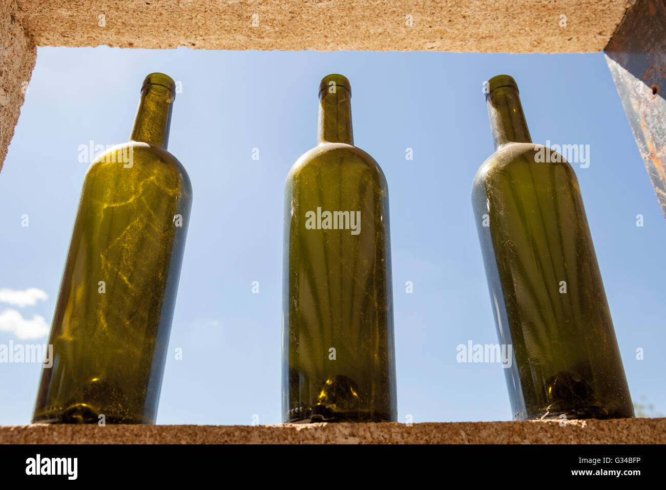 Three empty wine bottles hi-res stock photography and images - Alamy