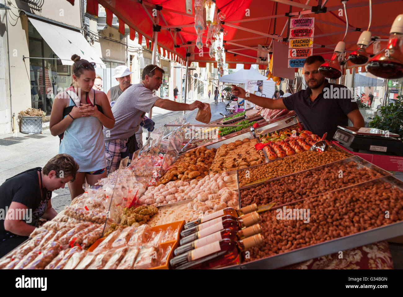Tourists buying food at a food stall, Olbia, Sardinia, Italy Stock ...