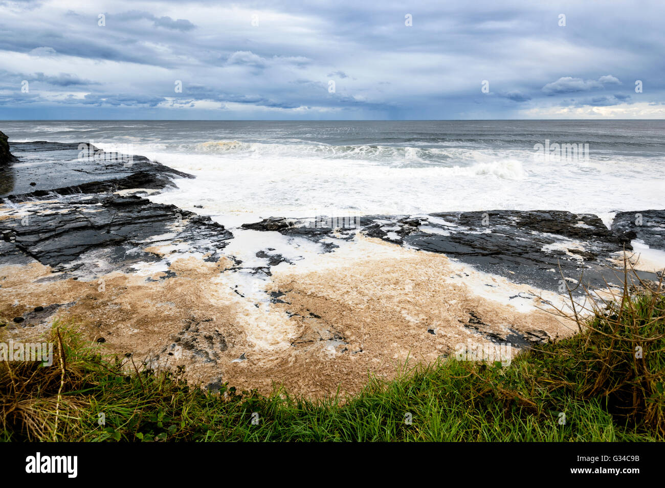 Dirty looking foam and heavy seas, Gerroa headland, Black Head Point ...