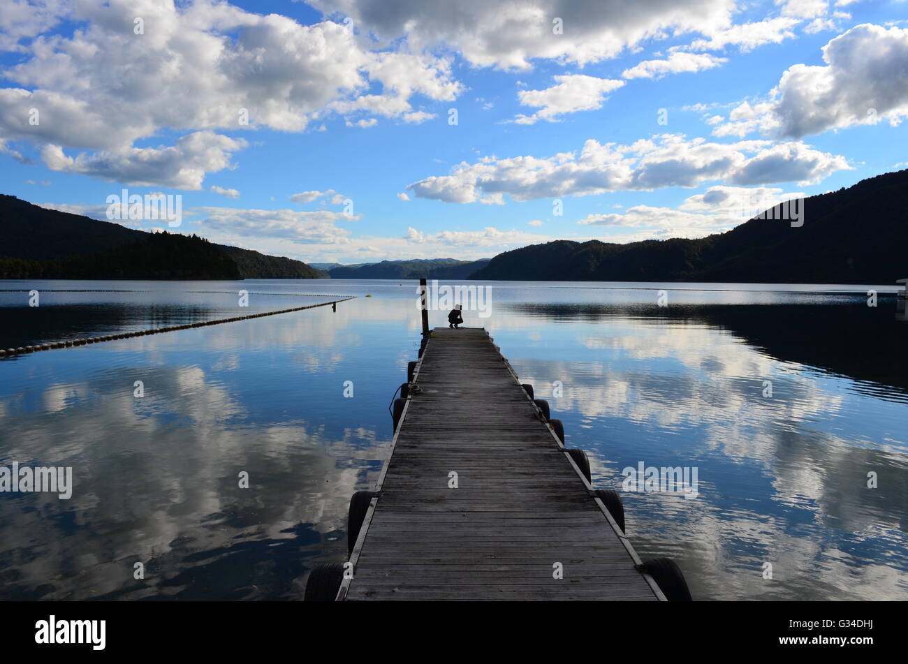 Lake Okataina, evening mirror lake effect Stock Photo - Alamy
