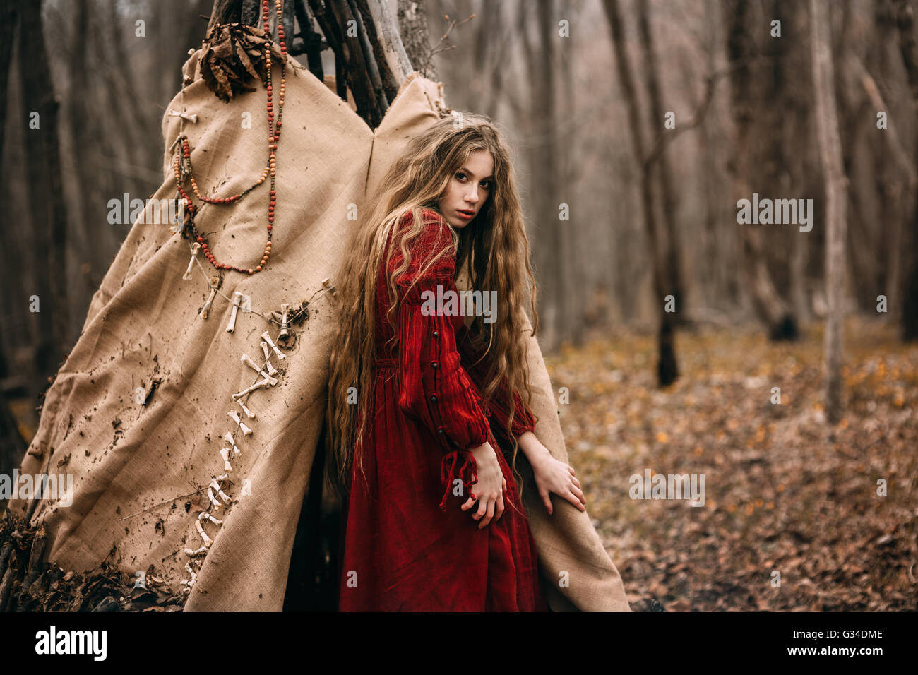 Witch in forest Stock Photo - Alamy