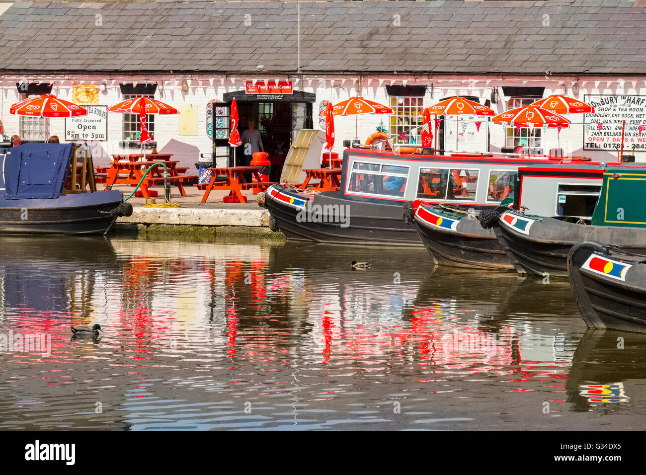 Reflections in the Shropshire Union Canal at Norbury Junction Wharf ...