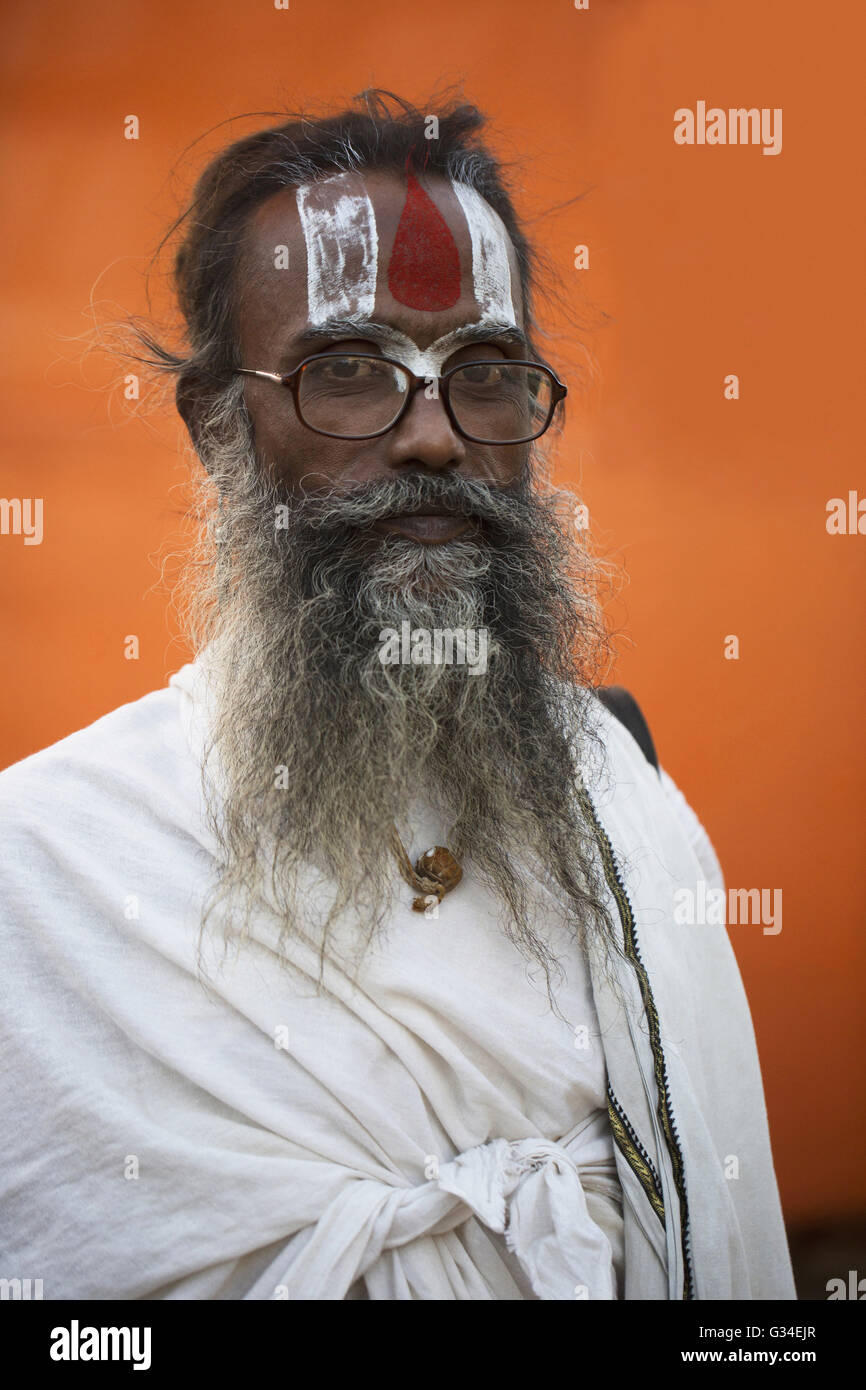 Sadhu in white colored clothing and matted hair. Kumbh Mela 2016 ...