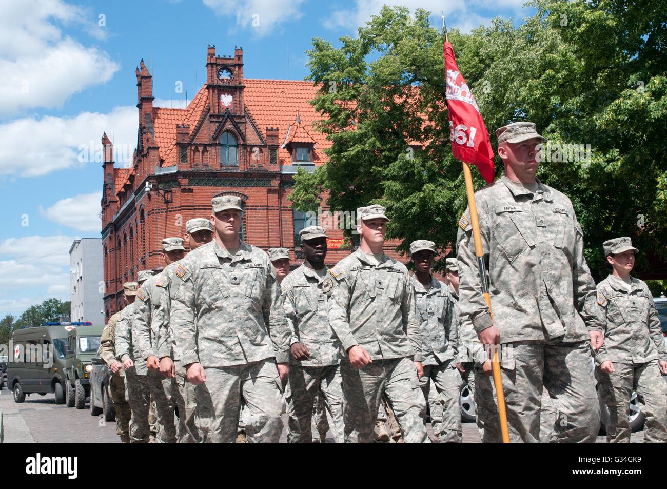 U.S. Army Soldiers of the 361st Engineer Company march along with ...