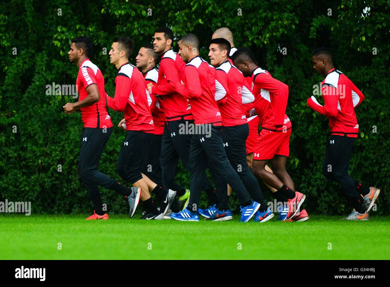 SAO PAULO, Brazil - 07/06/2015: TRAINING SPFC - Players holding during ...