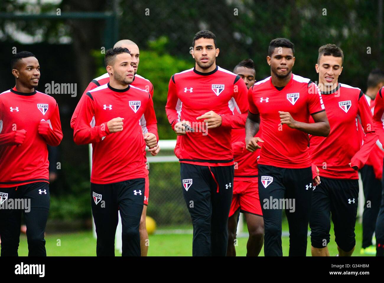 SAO PAULO, Brazil - 07/06/2015: TRAINING SPFC - Players holding during ...