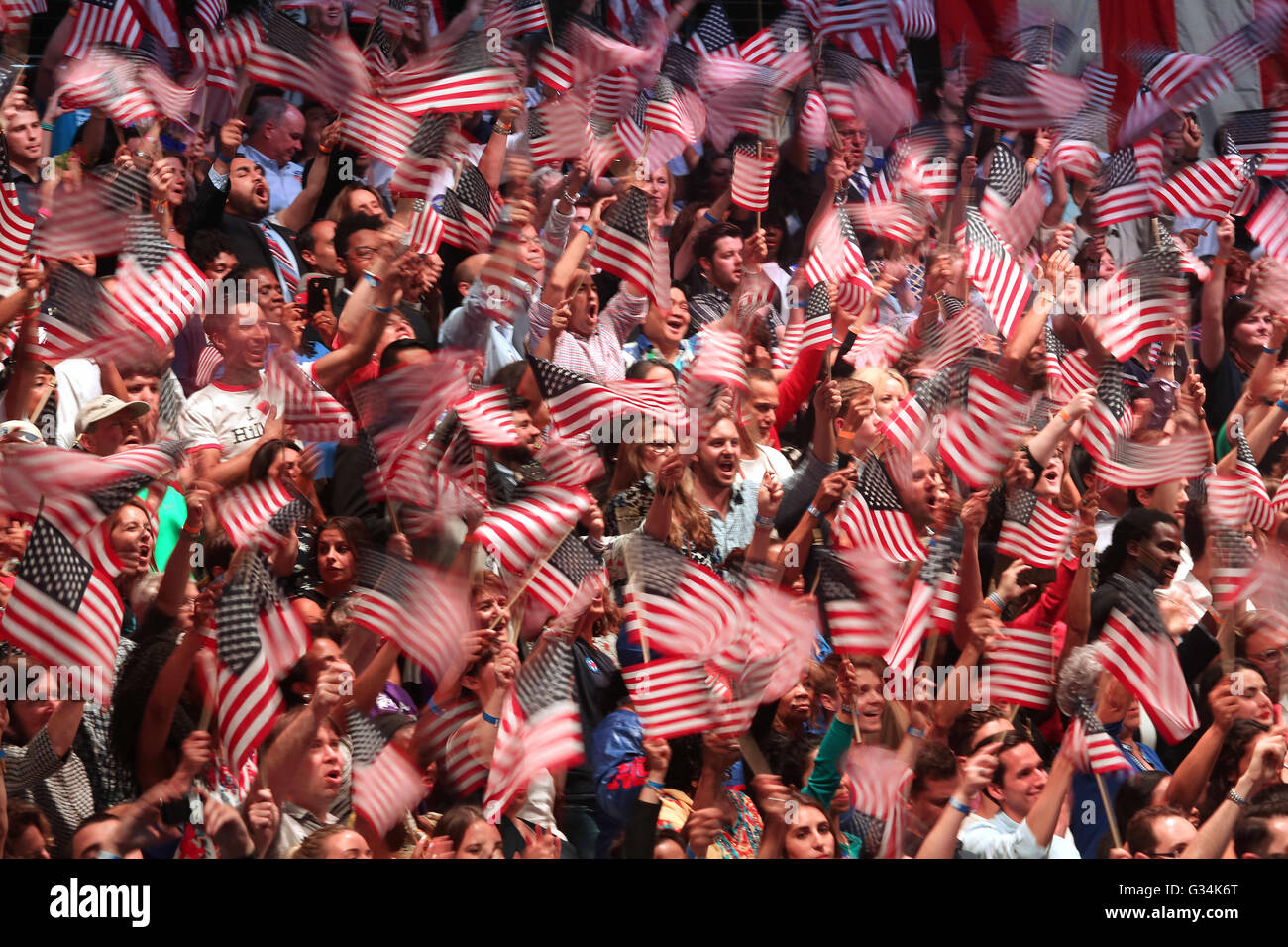 New York, NY, USA. 7th June, 2016. People cheer and wave flags as ...