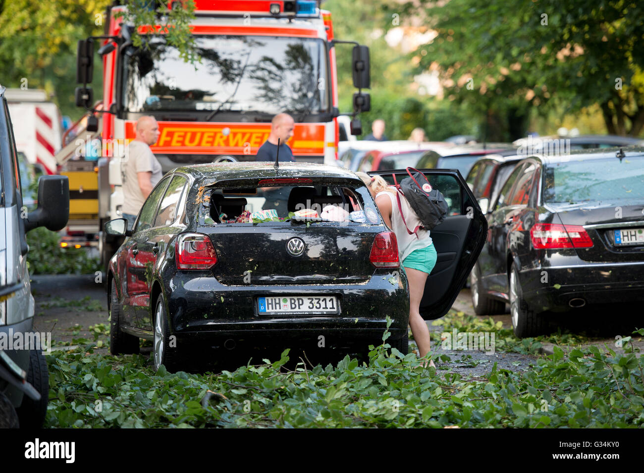 A damaged car stands in a street in Hamburg, Germany, that was ravaged ...