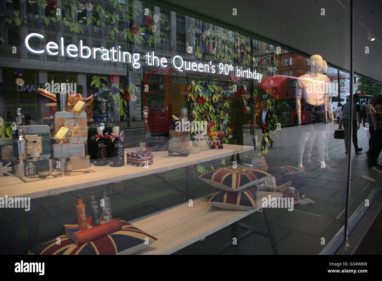 London, UK - 8 June 2016 - shoppers look at the John Lewis' window ...