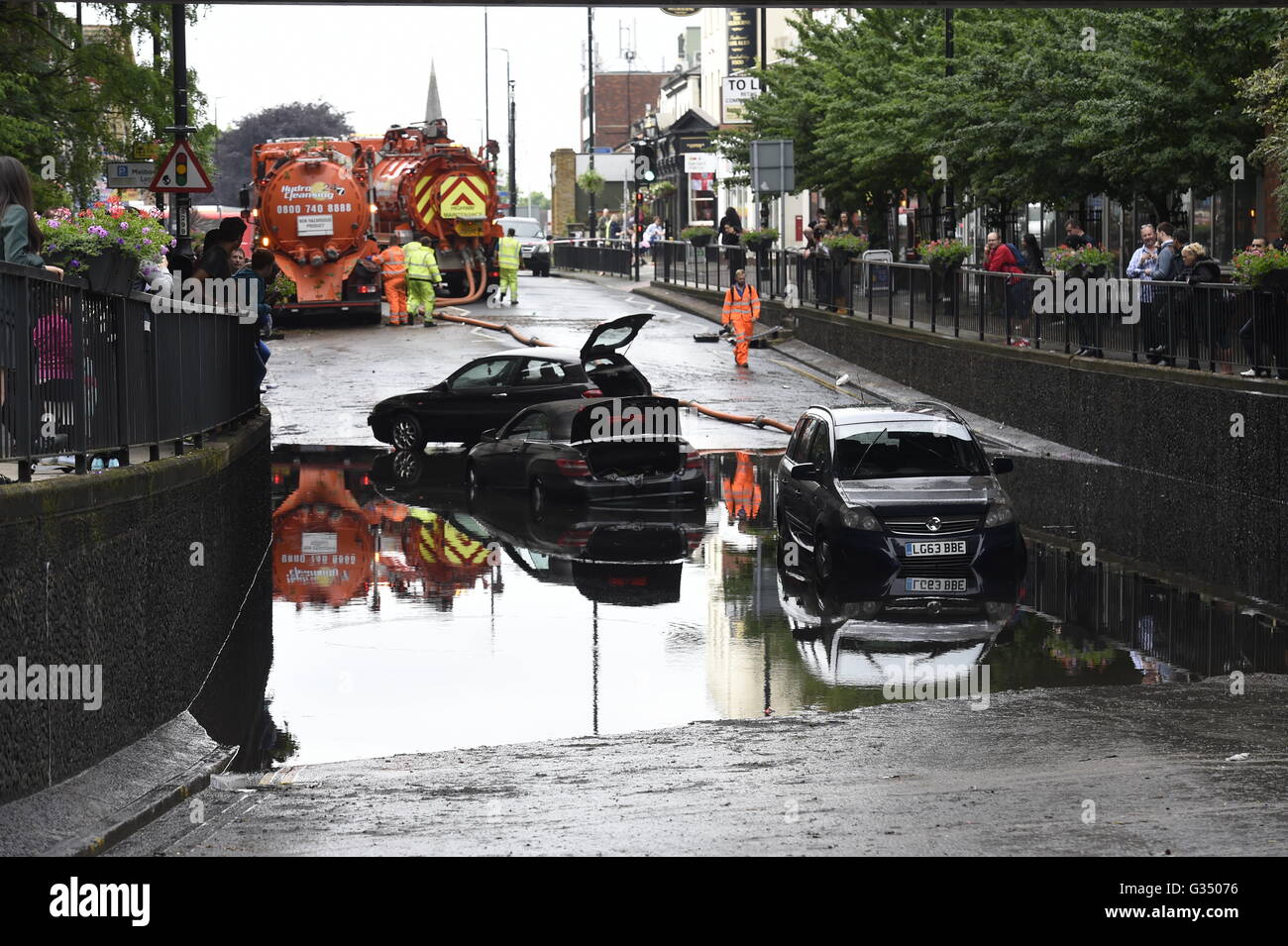 The aftermath of a flash flood in Manor Road in Wallington, Surrey ...