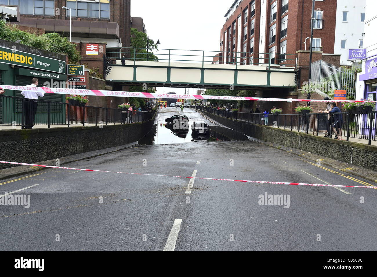 The aftermath of flash flood in manor road in wallington hi-res stock ...