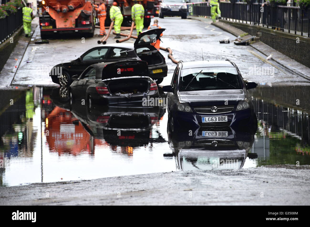 The aftermath of a flash flood in Manor Road in Wallington, Surrey ...