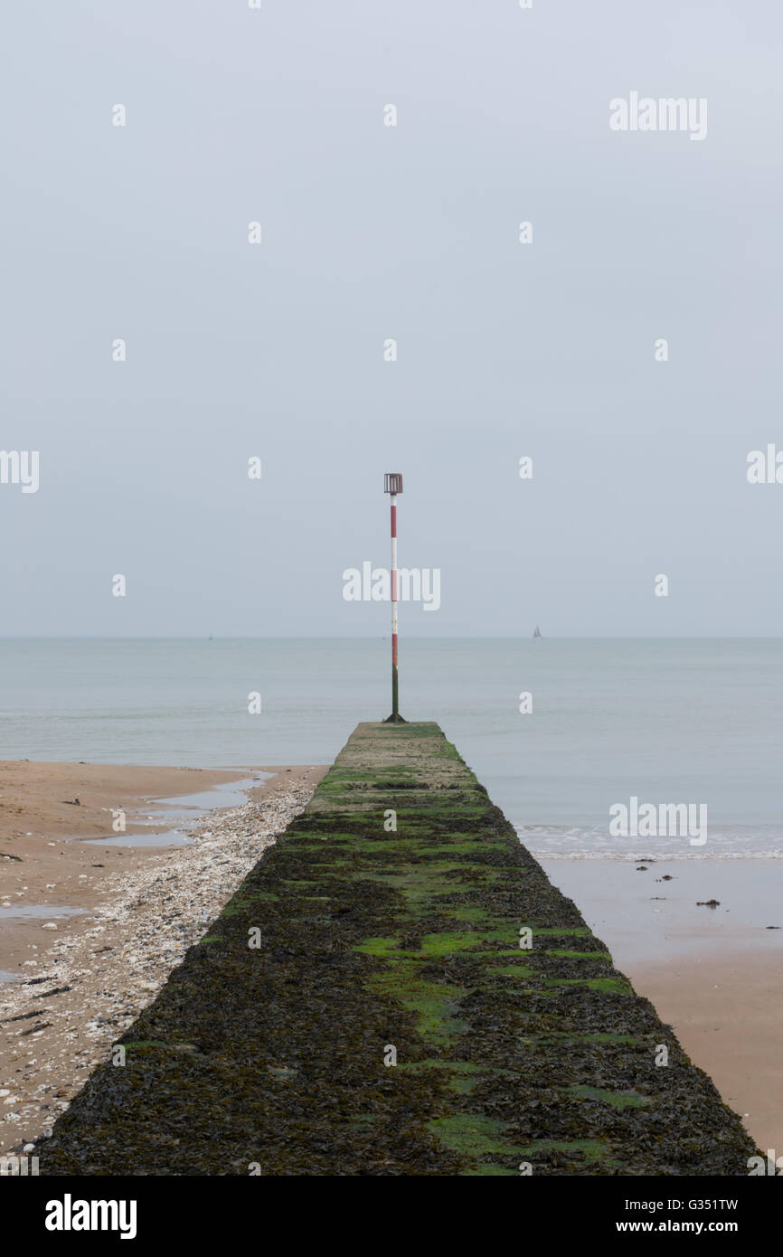 A post on a beach in Kent Stock Photo - Alamy