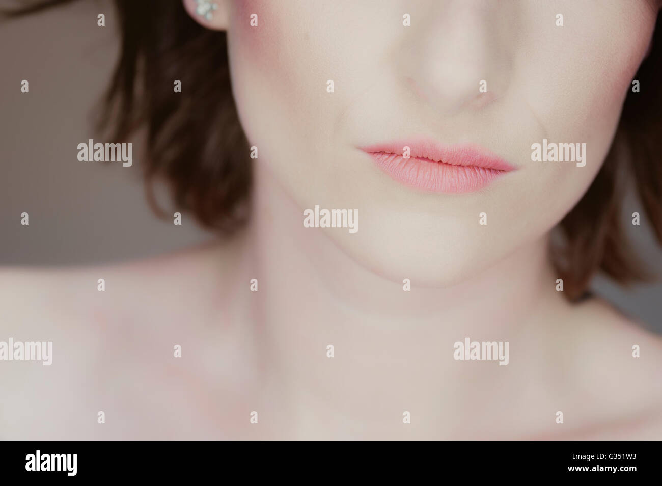 Woman's closed mouth Stock Photo - Alamy